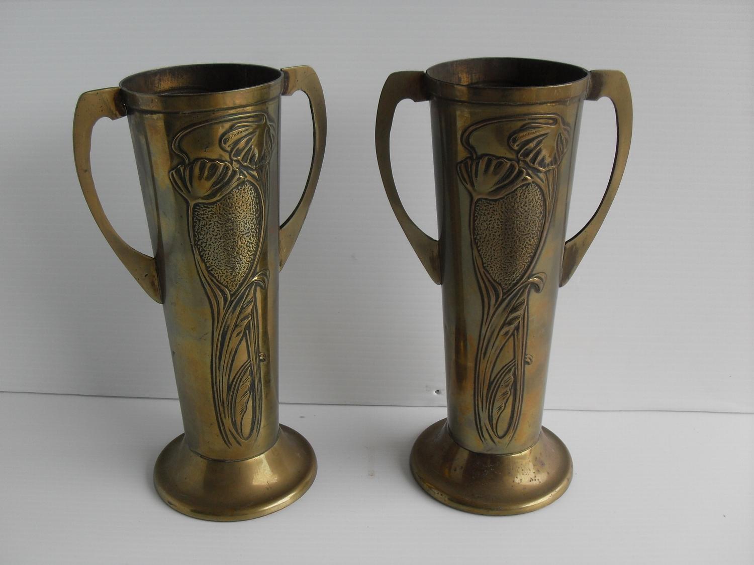 A pair of Beldray Art Nouveau brass two-handled vase on circular bases ...