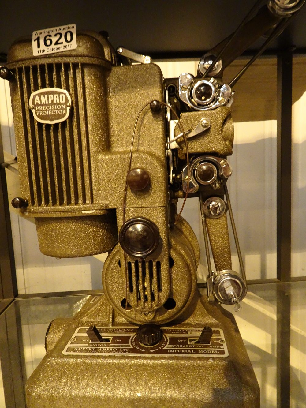 16mm projector by Simplex Ampro with accessories