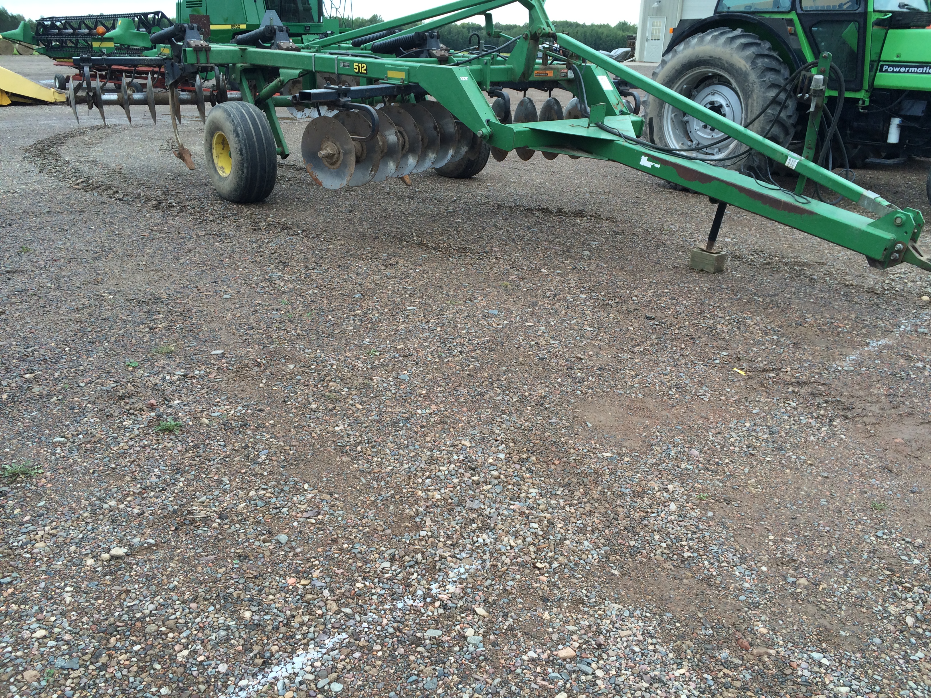 John Deere 512 Disk Ripper, 5 Shanks, Rock Flex Disk Gangs, 12ft. 6".