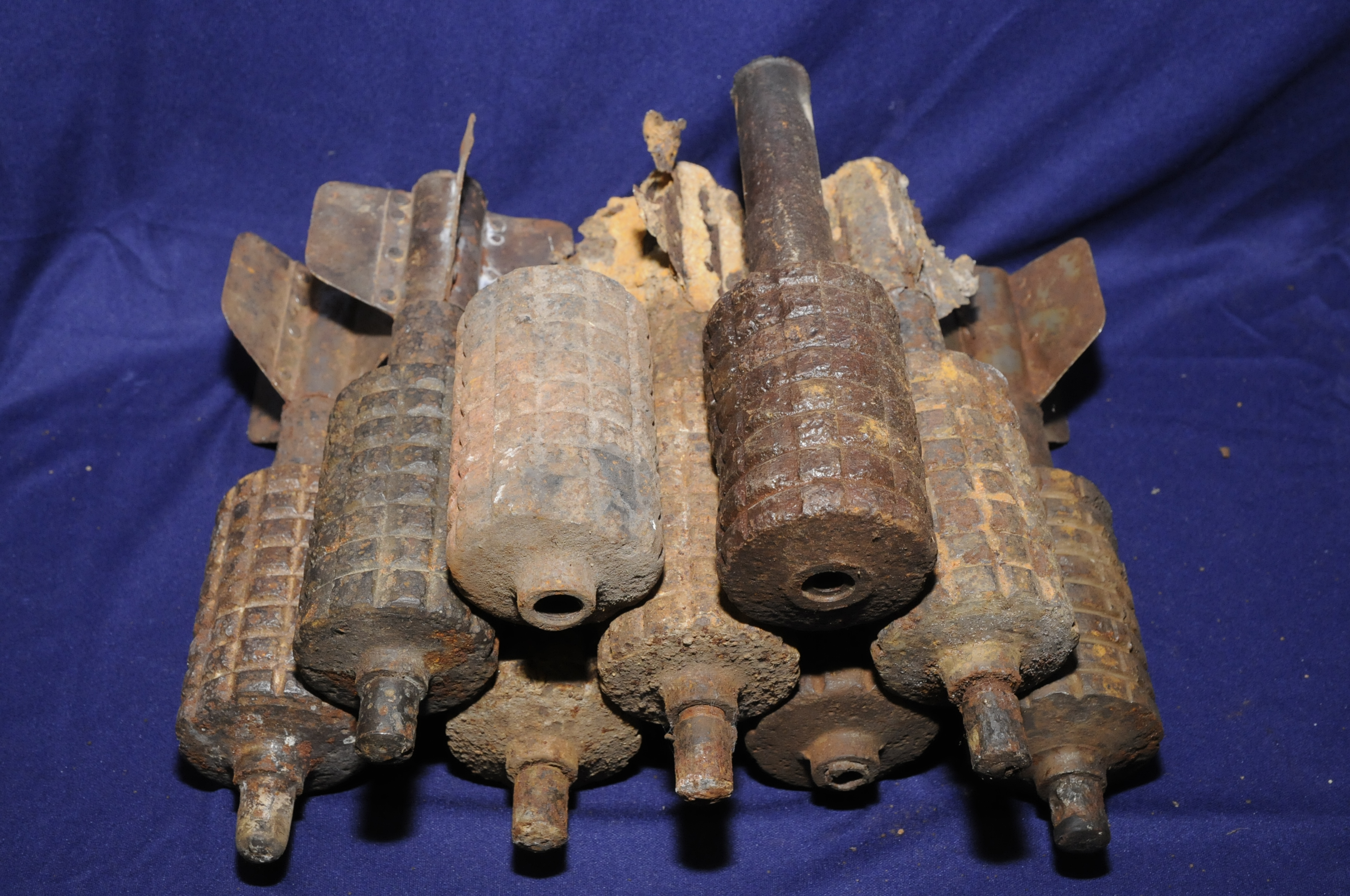 Quantity of WWI German Spigot mortar bombs, some with fuses and some ...