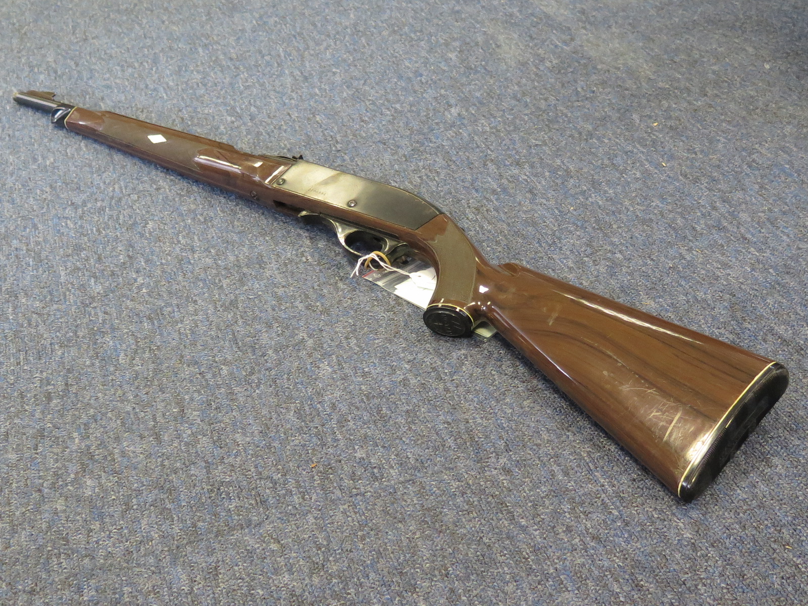 Rifle: A semi-auto 'Remington Nylon Model 77' .22 cal sporting rifle ...