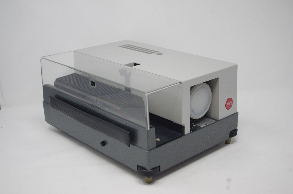 A Leitz projector, a mini Minolta 35 slide projector and an ILFORD ELMO ...