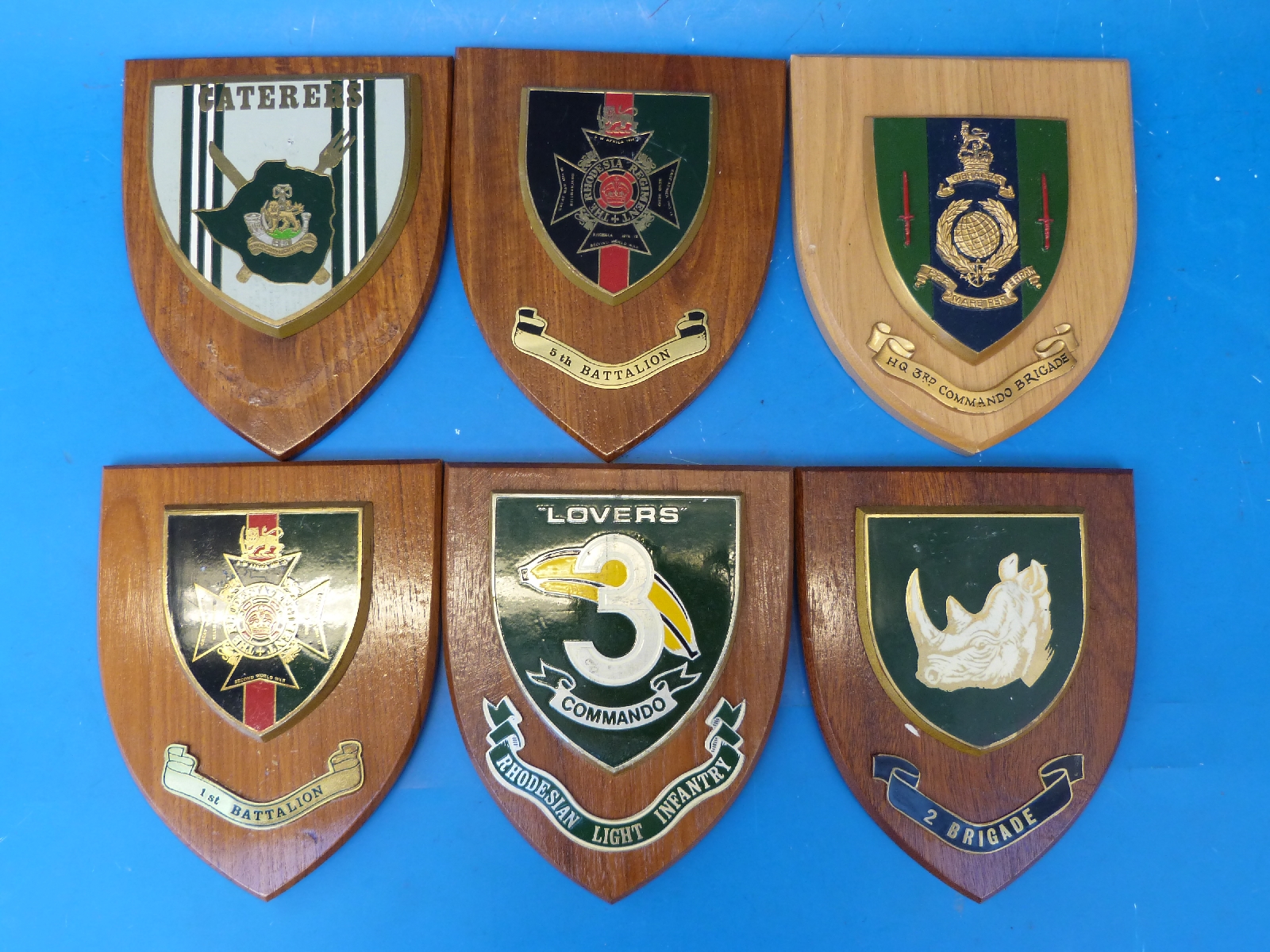 Six Rhodesian military plaques including 2nd Brigade, "Lovers" Commando ...
