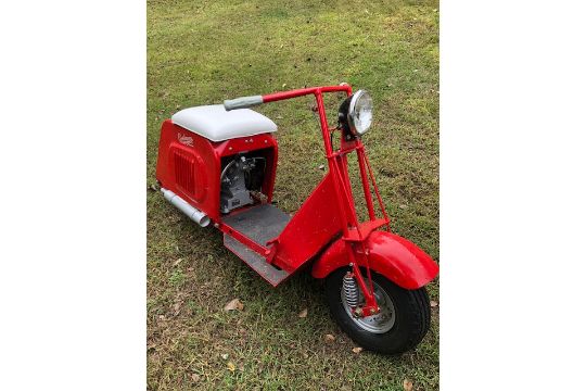 Fully restored Cushman box step through Husky motor scooter