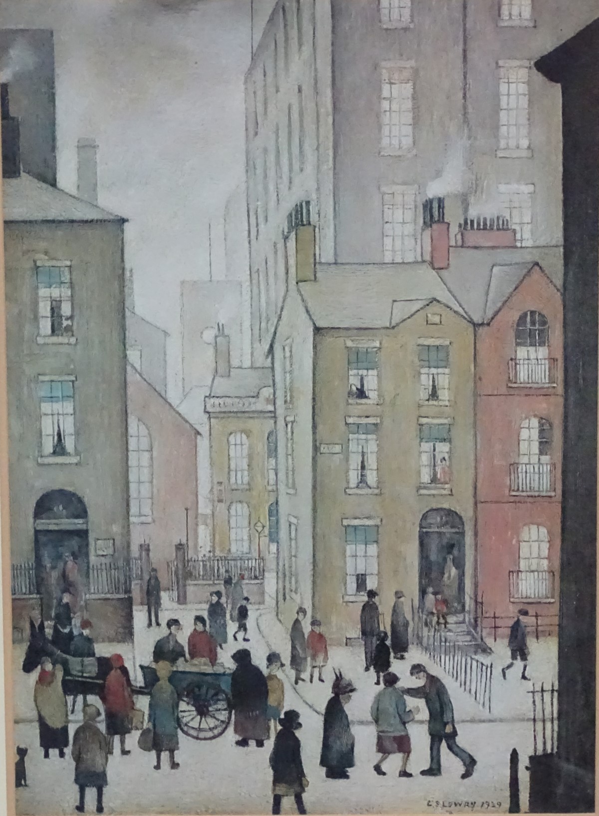 After LS Lowry,Two reproductions,A Lancashire Village and another.The ...