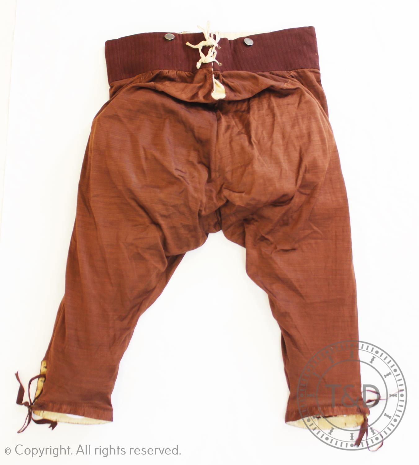 A rare pair of men?s breeches, circa 1820, in brown, with striped ...