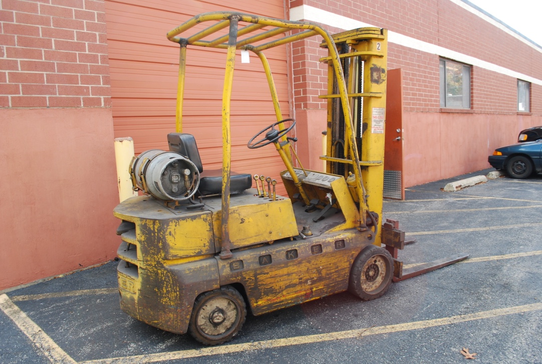 BAKER 4000 LB. CAP. MODEL FMD-040 LP FORK LIFT TRUCK: S/N G-1842-1266 ...