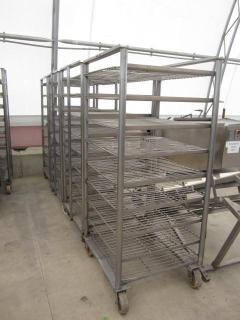 Lot of 4 stainless steel racks on wheels, 9 shelves each, 68" tall x 32 ...