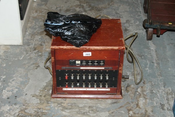 1950s GPO 2+4 switchboard with dolls' eye indicators, in wooden case