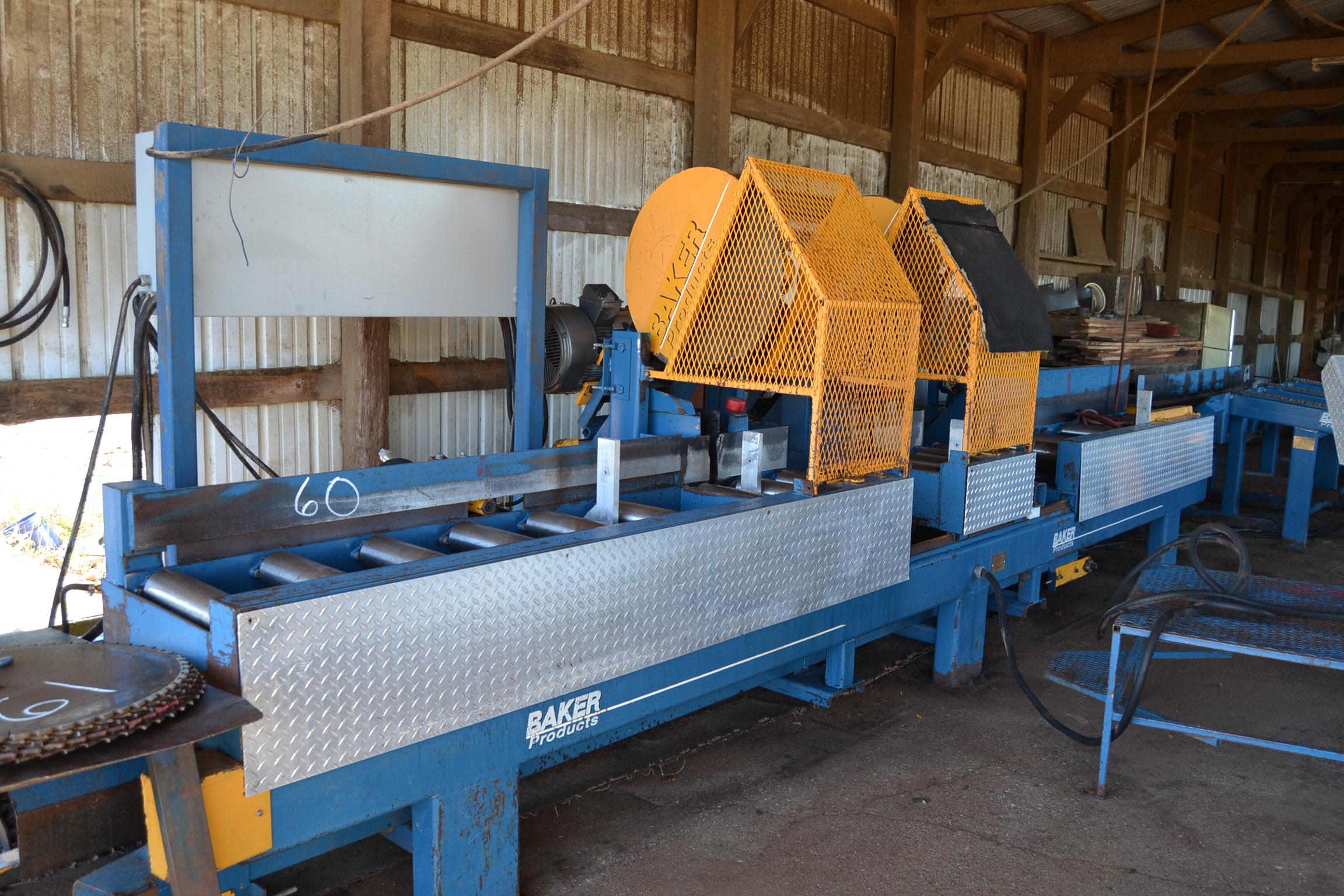 BAKER 2 HEAD MULTIPLE CHOP SAW SYSTEM W/ HOLD DOWN W/ ROLLCASE FEED W ...