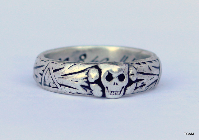 A Nazi SS silver skull ring engraved on the inside S.A.W. Lorenz 30. 8 ...