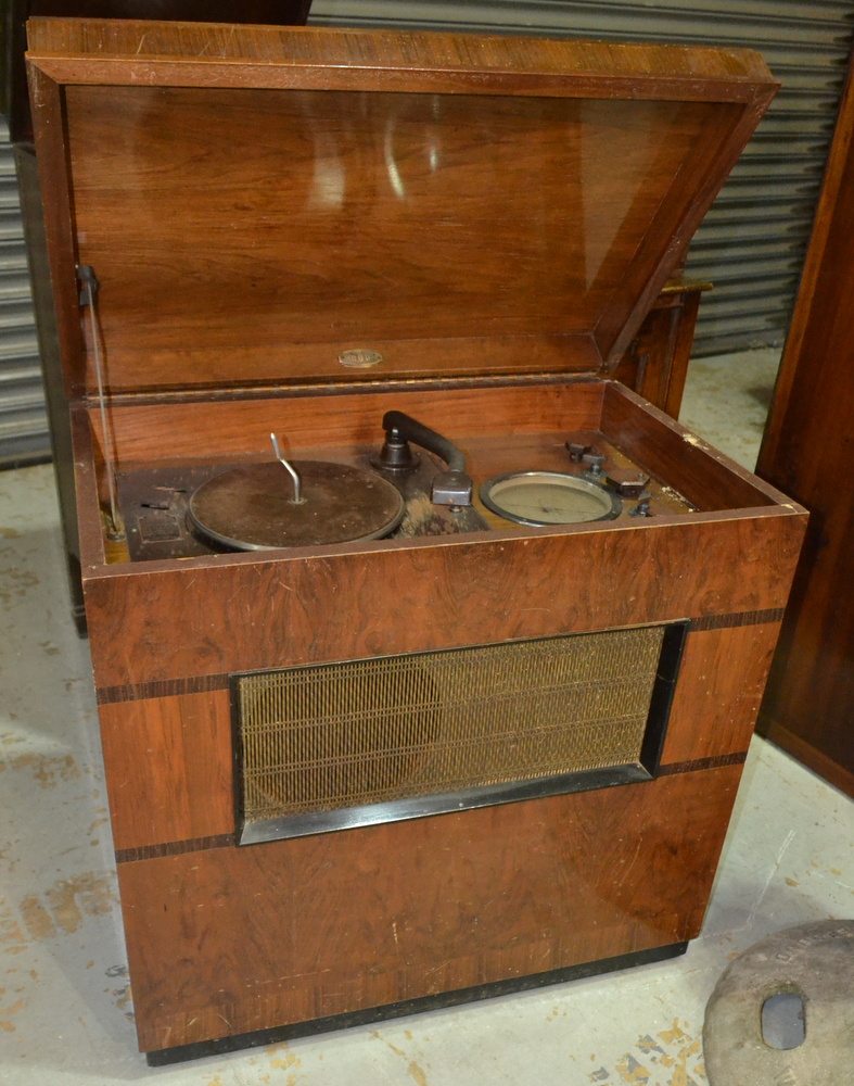 A 1930s walnut cased radiogram, fitted with a Garrard deck and dial ...
