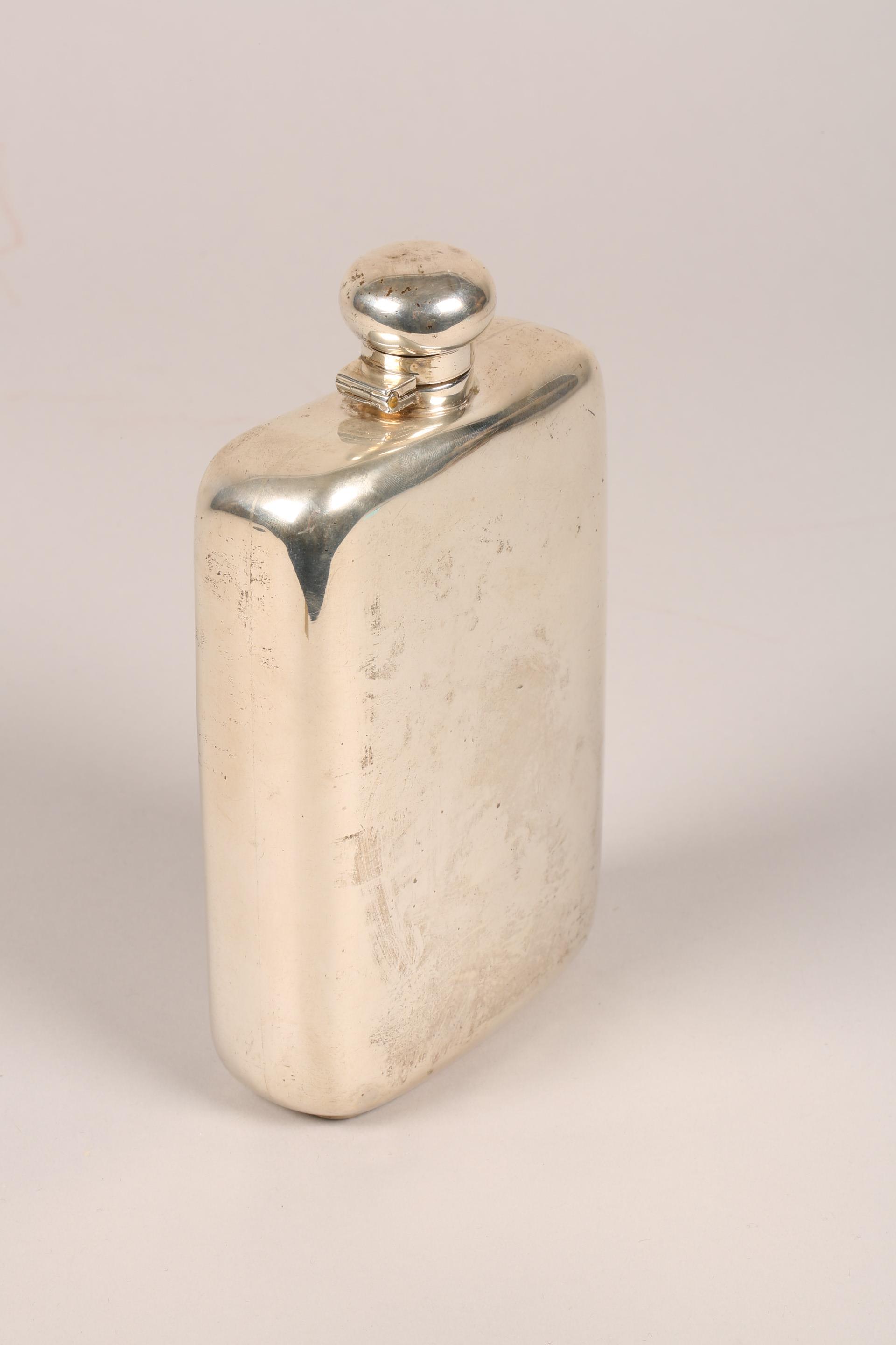 Sterling silver hip flask, stamped Birks. 17.5cm high, 292g The hip ...