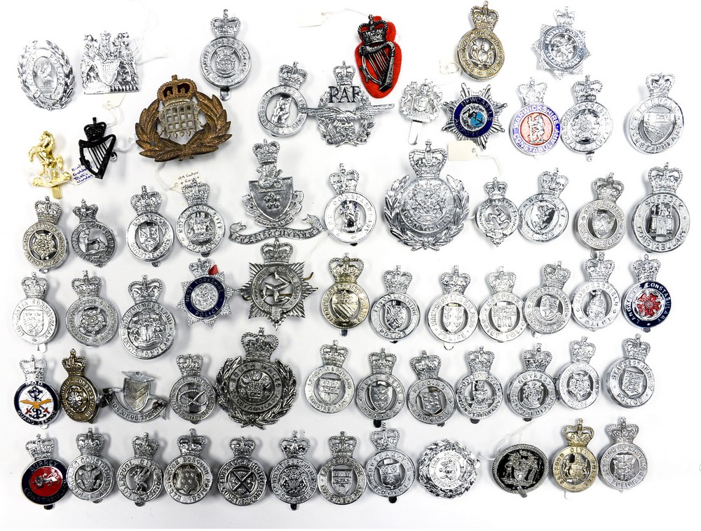 A collection of over sixty British Police Cap badges, all with Queens ...