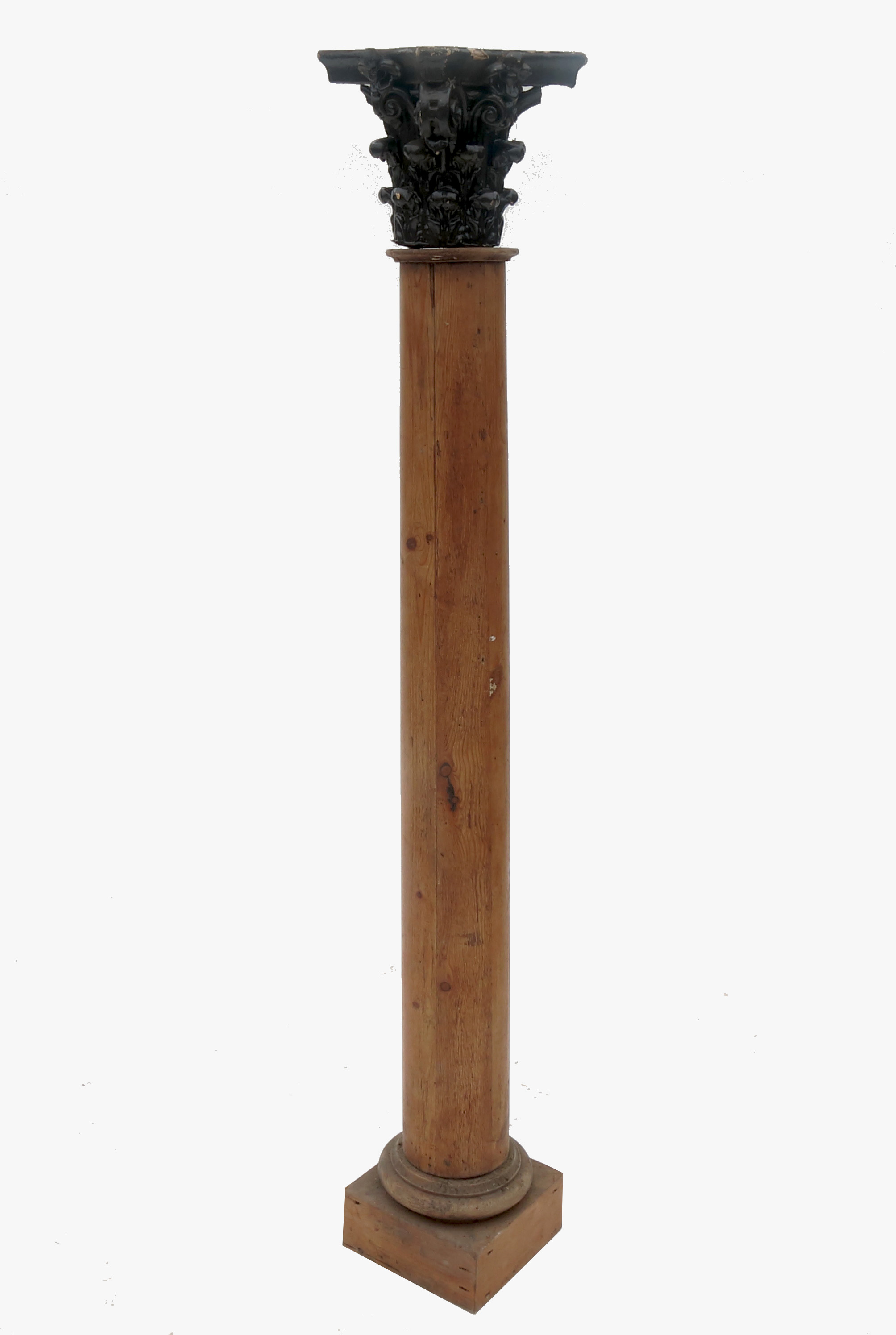 A pair of turned wooden columns, with carved capitals over, height ...