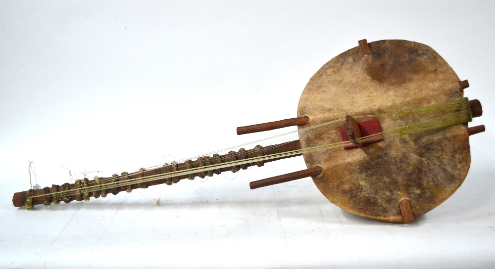 An African tribal Kora (stringed instrument), from Guinea Bissau, the ...