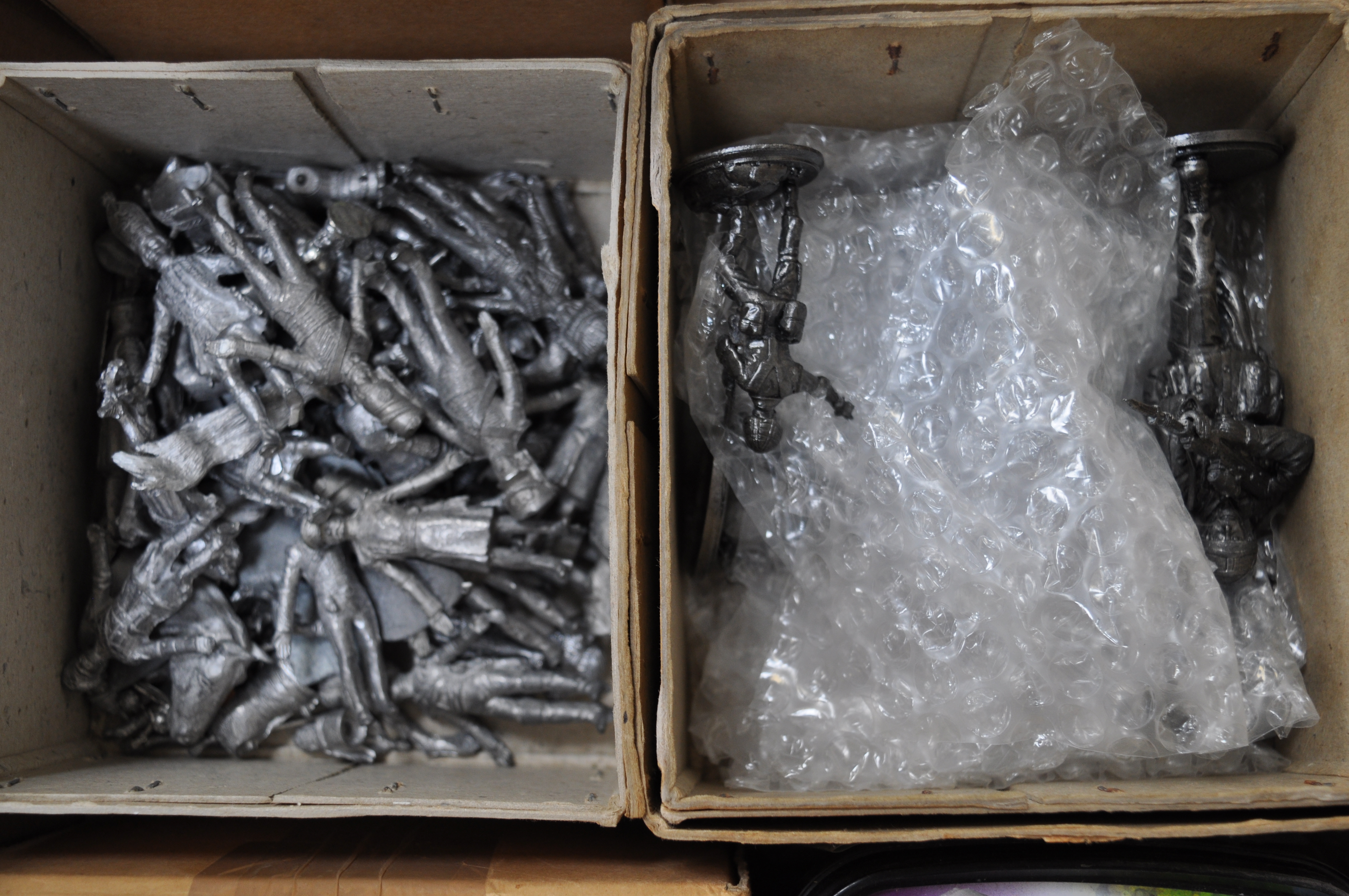 Collection of finished and part finished metal models, military figures ...