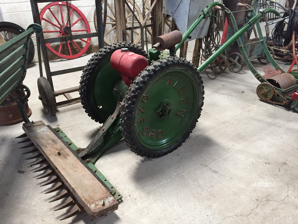An Oxford Allen scythe with spare cutter bar and two cutter blades