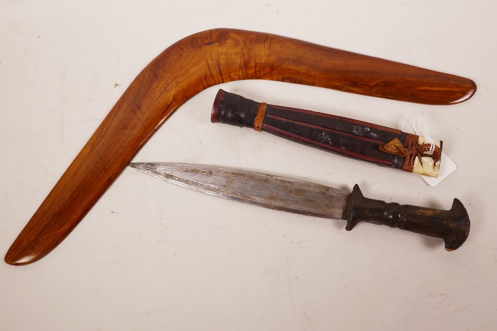 An African tribal dagger with wooden handle and leather sheath, 12 ...