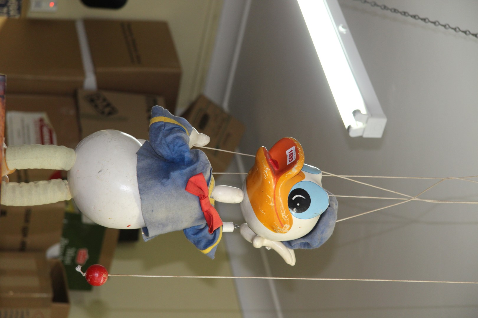 An oversized Pelham 'Donald Duck' puppet.