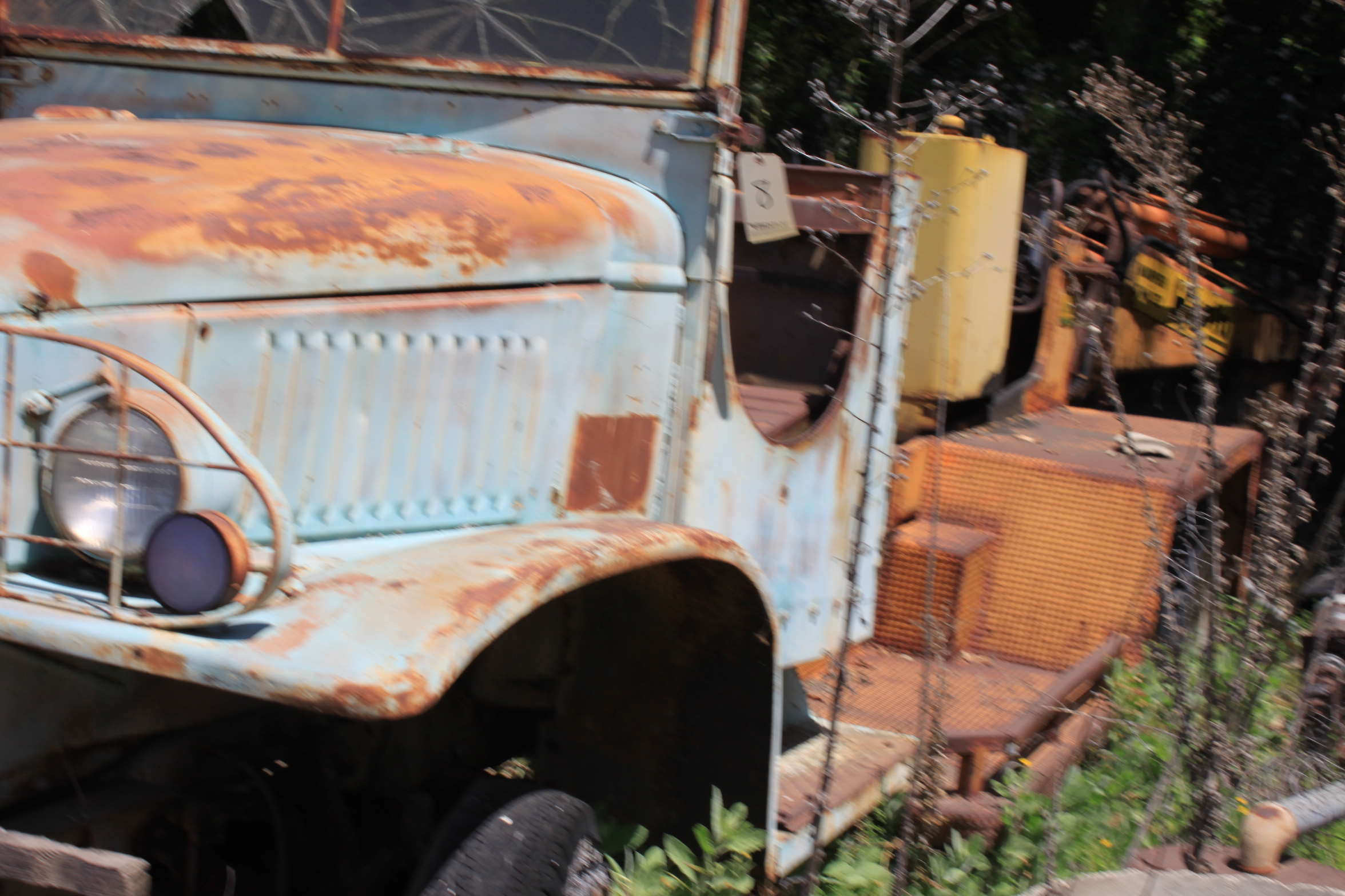 Truck w/ Hopto Excavator Attachment on Back