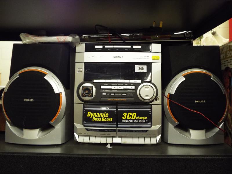 A Phillips hi-fi system with 3 CD disc changer, tape deck, radio and an ...