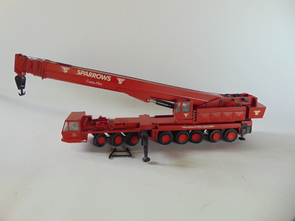 A Conrad die cast model of a crane, in sparrow livery, model 2077, made ...