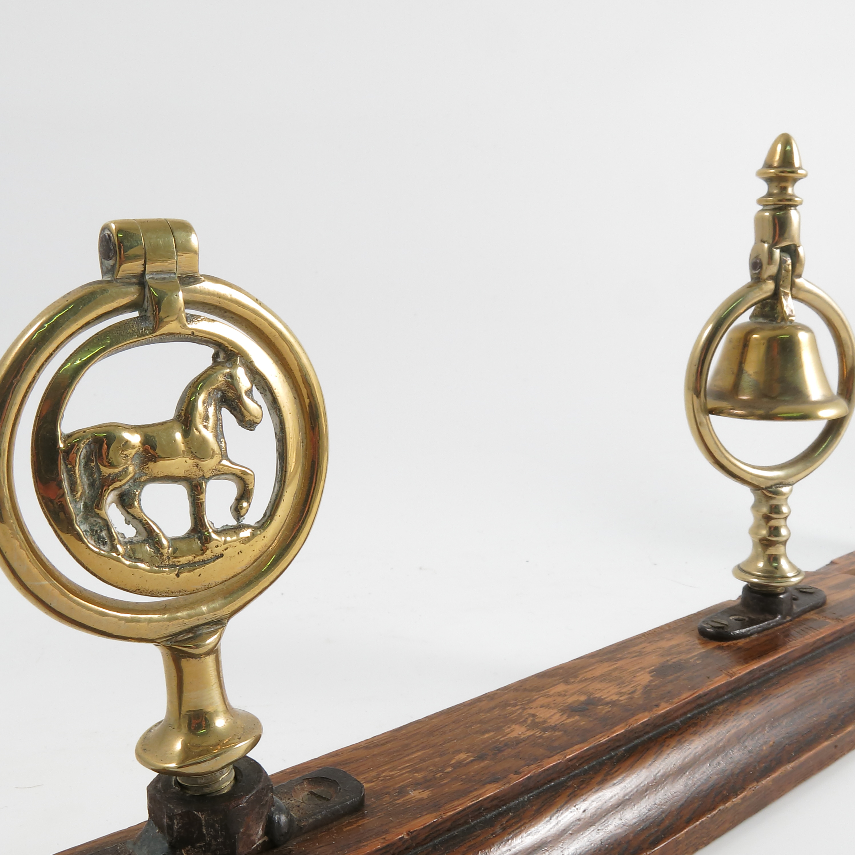 A group of brass shire horse bells, to include a triple bell and horse ...