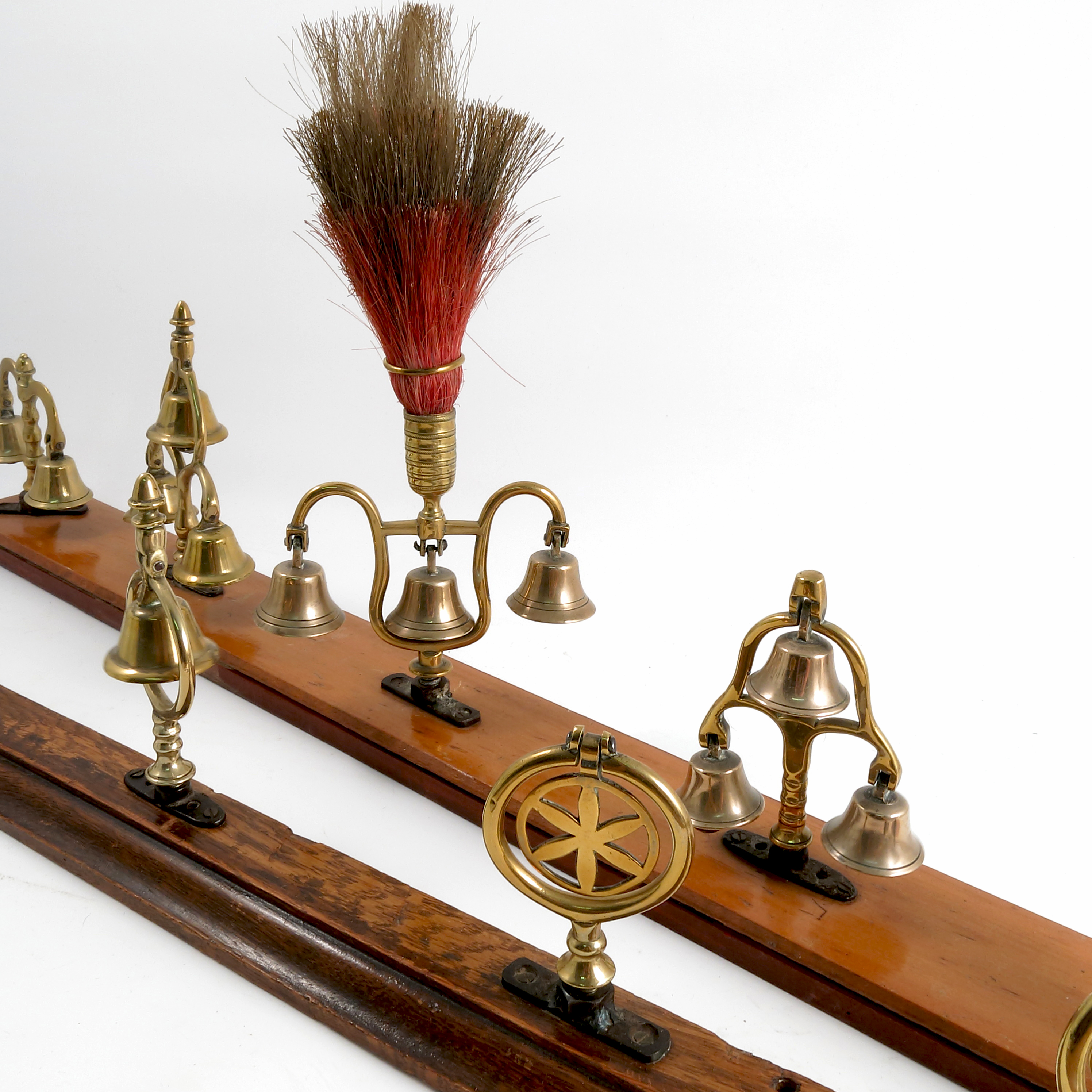 A group of brass shire horse bells, to include a triple bell and horse ...