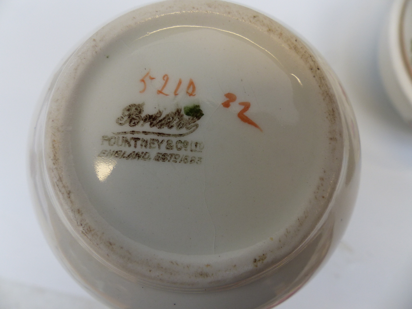 A Pountney/Bristol pottery dressing table set and vatrious Coalport ...