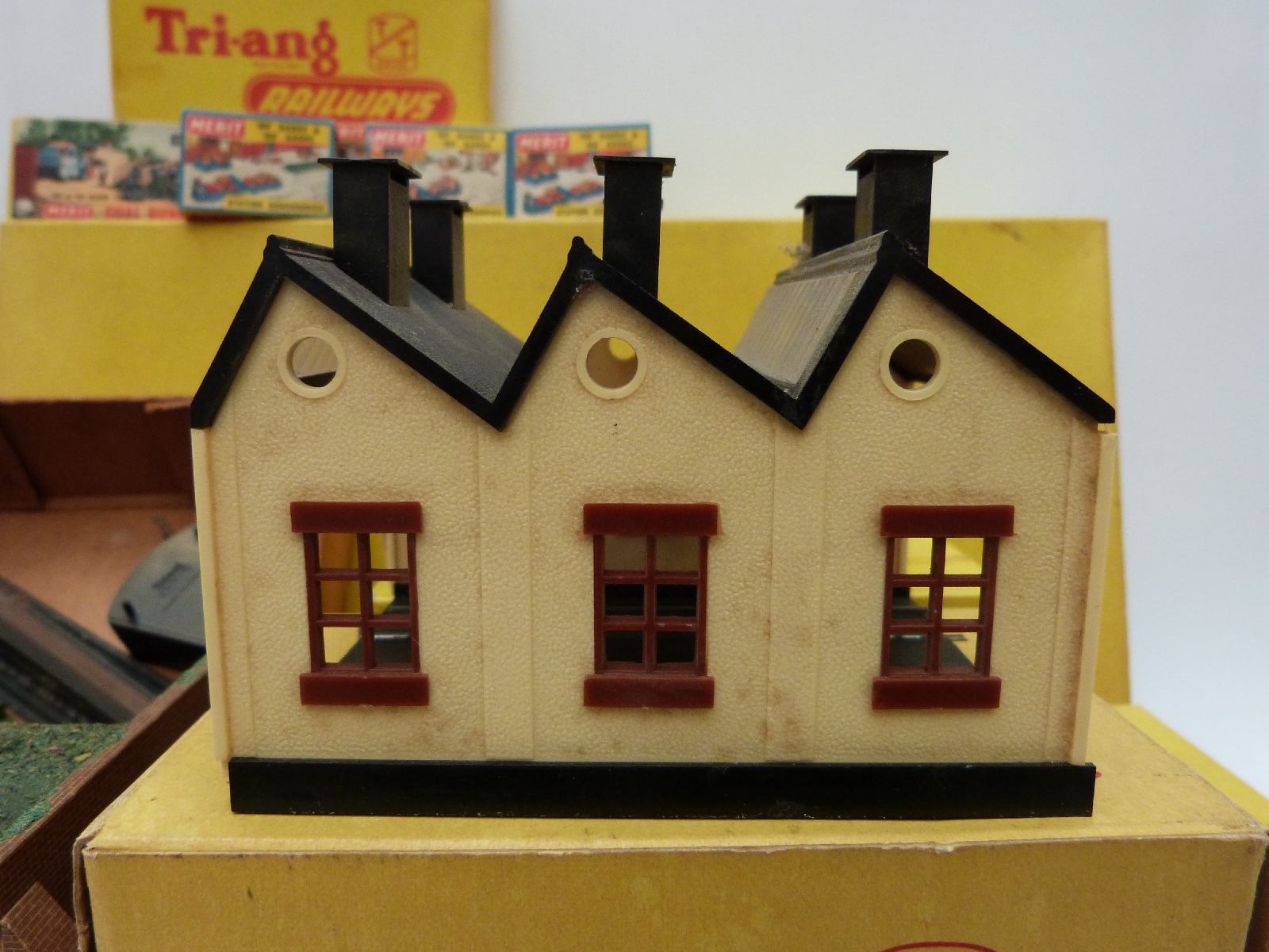 Twelve Tri-ang TT gauge buildings and track packs including station set ...