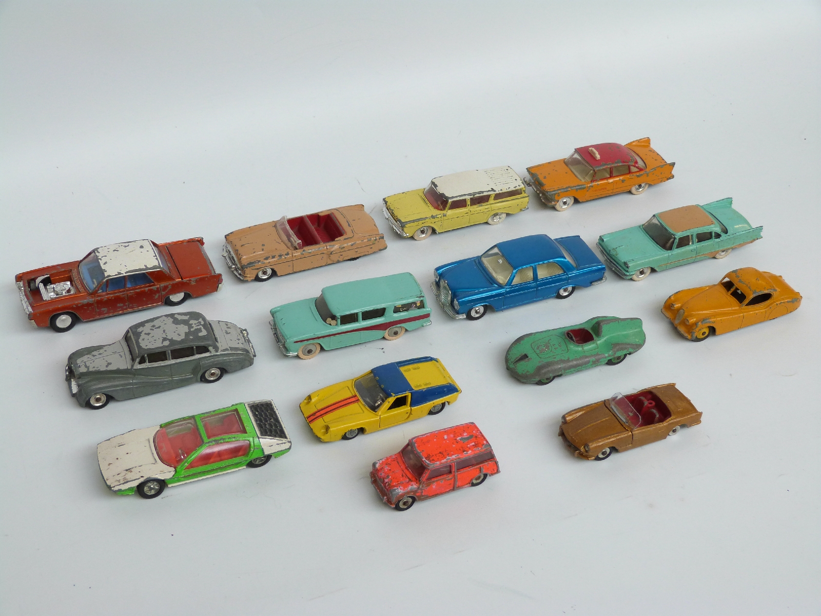 Fourteen Dinky Toys diecast model cars including Connaught 236, Jaguar ...
