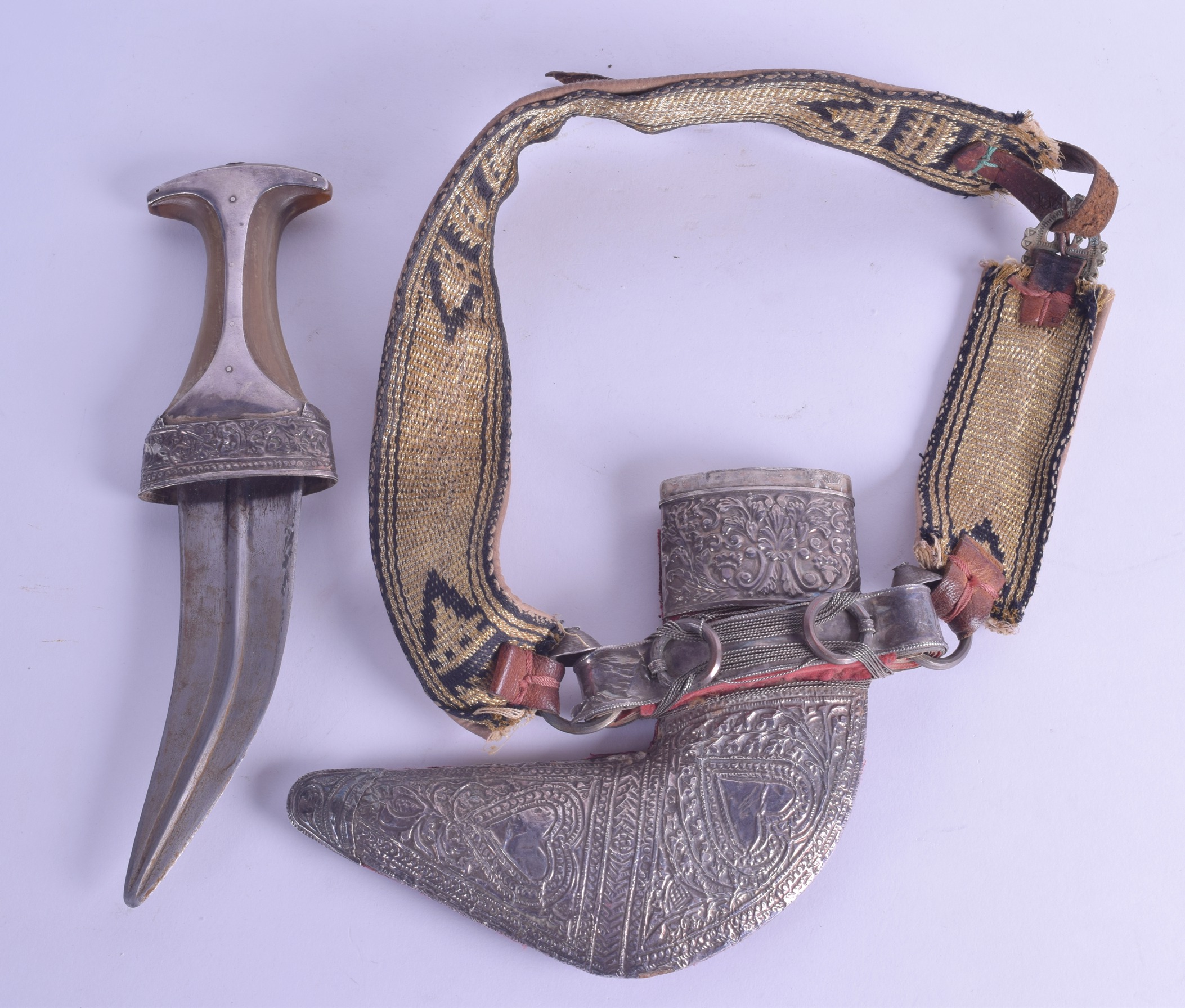 A 19TH CENTURY RHINOCEROS HORN HANDLED OMANI KHANJAR JAMBIYA DAGGER ...