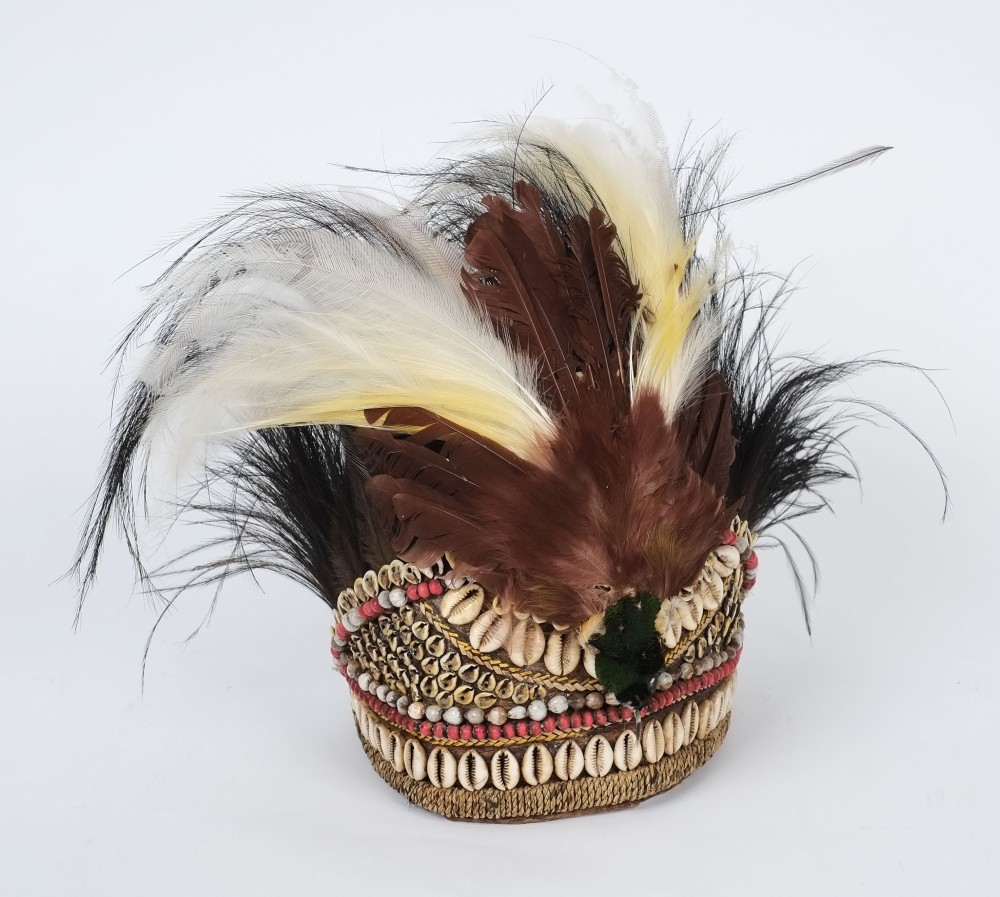 A Papua New Guinea feather and shell headdress:, of typical from with ...