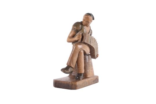 Attributed to Hans Huggler, a carved wooden figure depicting a ...
