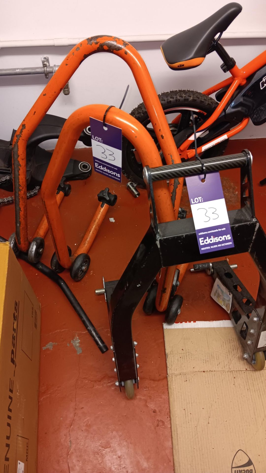 2x KTM Paddock Stands and Moto Grafix Paddock Stand