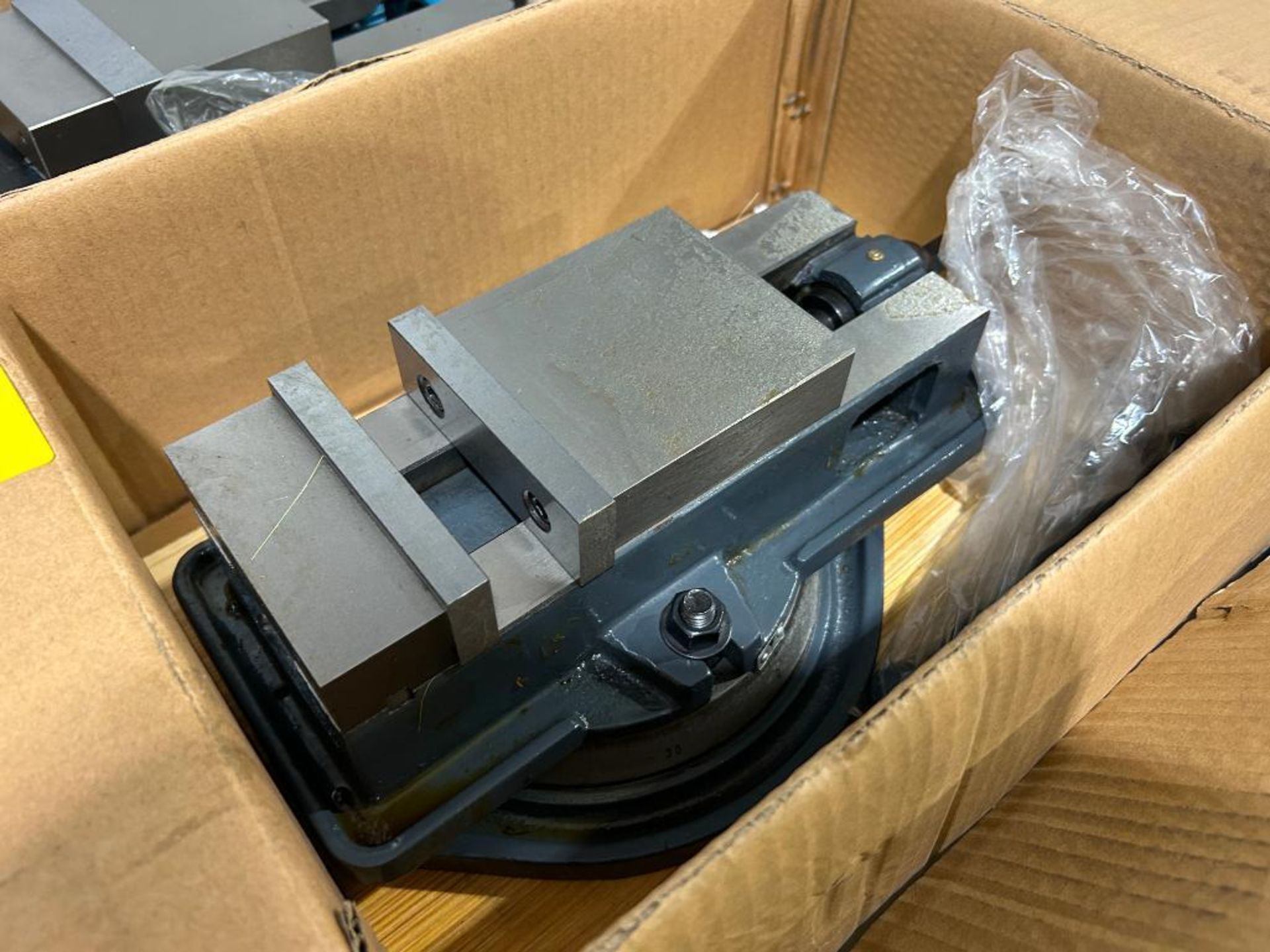 { Group of lots: 35, 36 (P) } 5" Machine Vise on Rotary Base