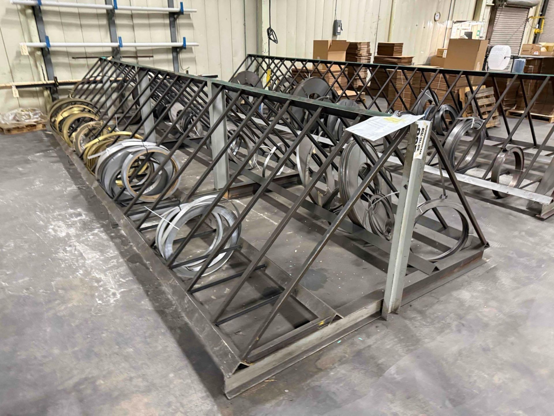 Metal Rack with Contents, Includes: Rolled Coil Steel and Brass