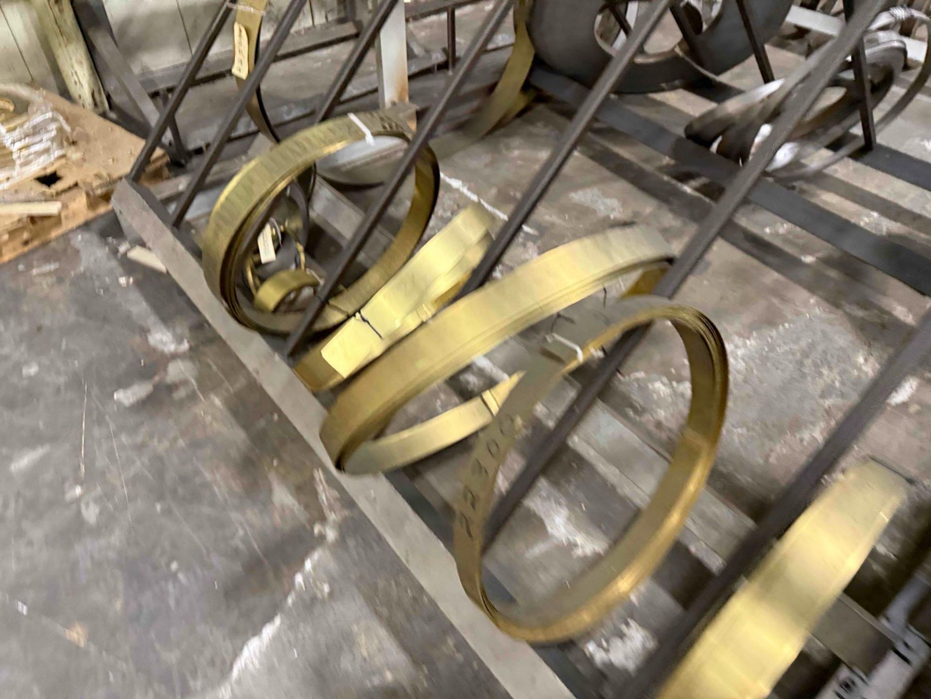 Metal Rack with Contents, Includes: Rolled Coil Steel and Brass