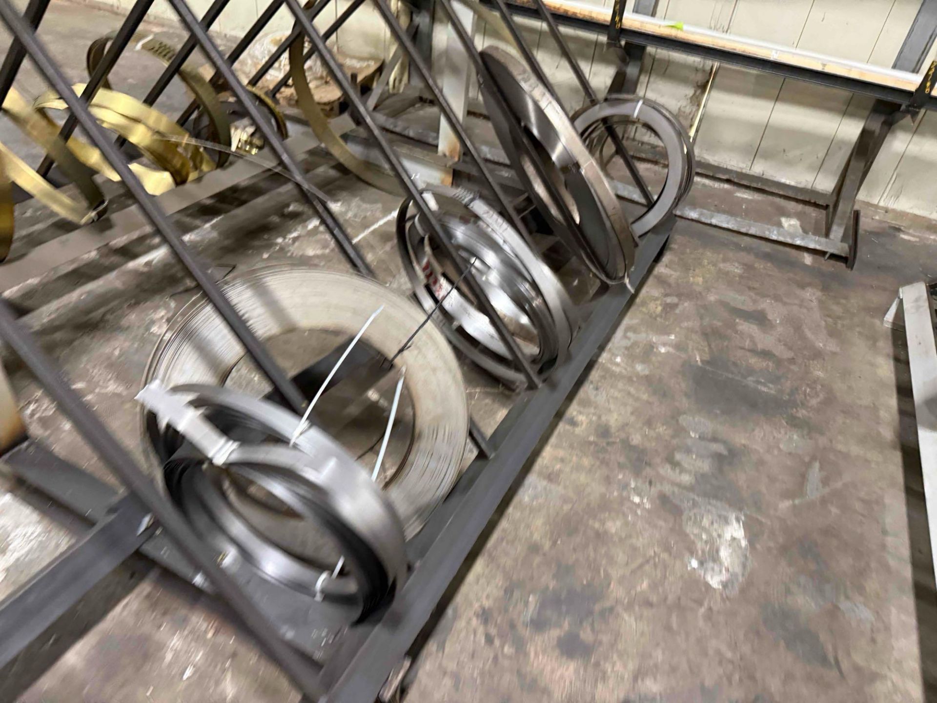 Metal Rack with Contents, Includes: Rolled Coil Steel and Brass