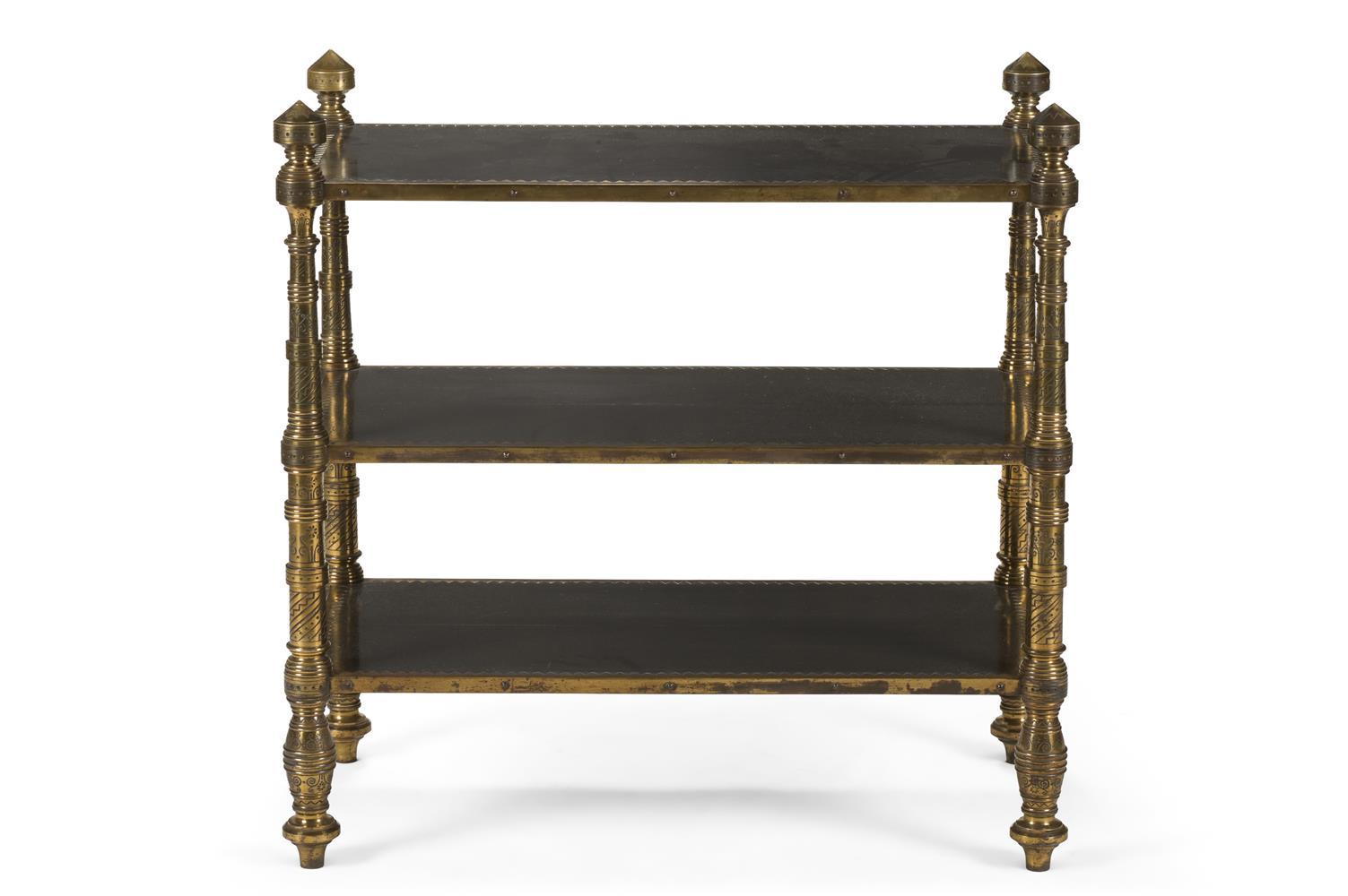 AN UNUSUAL AESTHETIC MOVEMENT EBONISED AND ENGRAVED GILT BRASS THREE ...