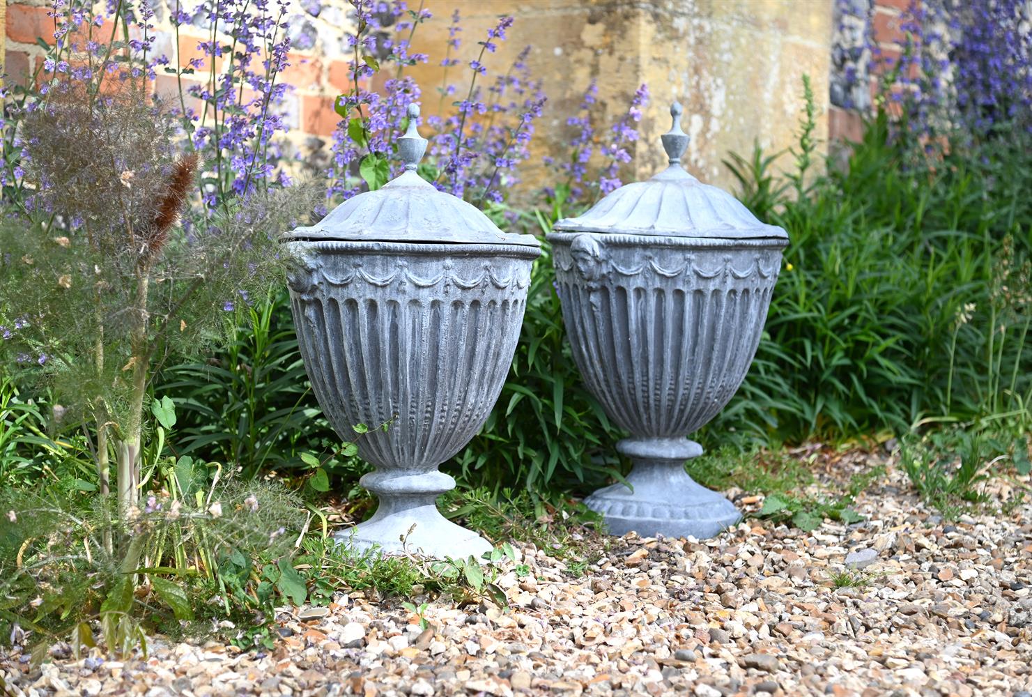 A PAIR OF LEAD URN FINIALS IN THE MANNER OF ROBERT ADAM, IN GEORGE III ...