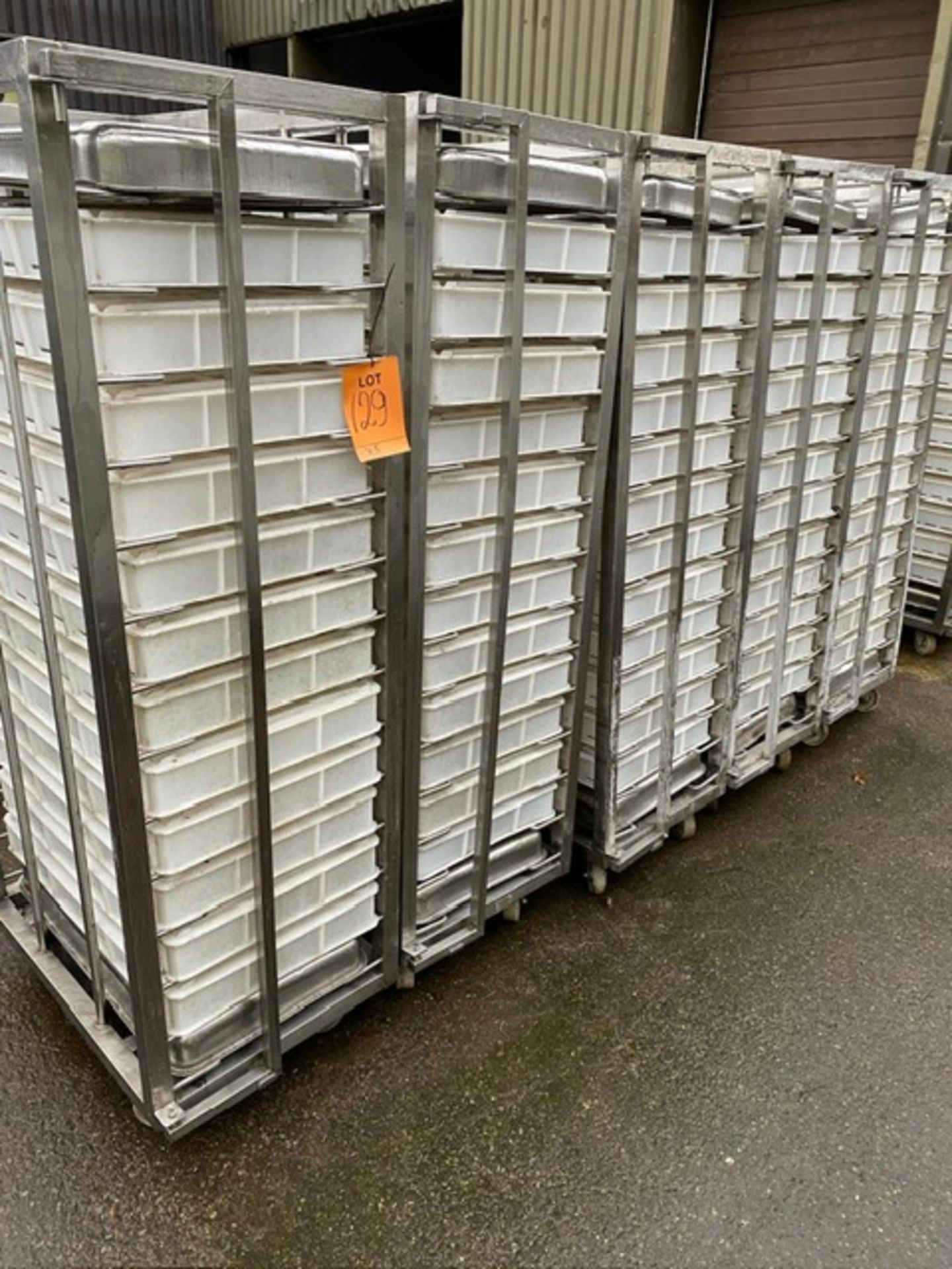 5 x Mobile trolleys - 14 tiers. With trays. Lift out: TBC