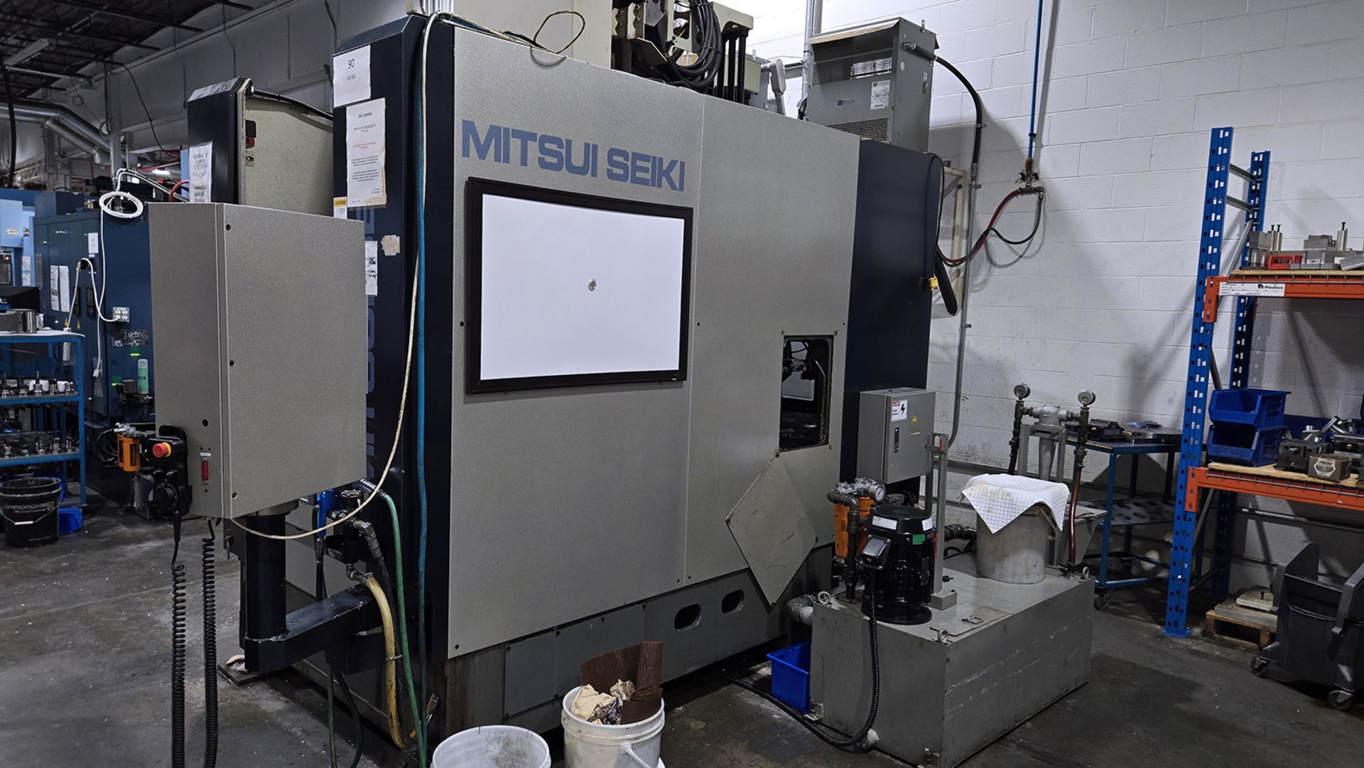 Mitsui Seiki VTX55X 5 Axis Machining Center (2008) Description XCat 40 ...