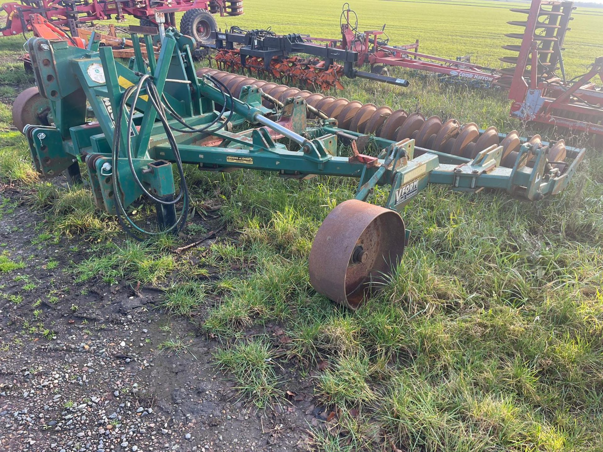 Cousins 9 leg V-form subsoiler, DD packer, legs on pallet