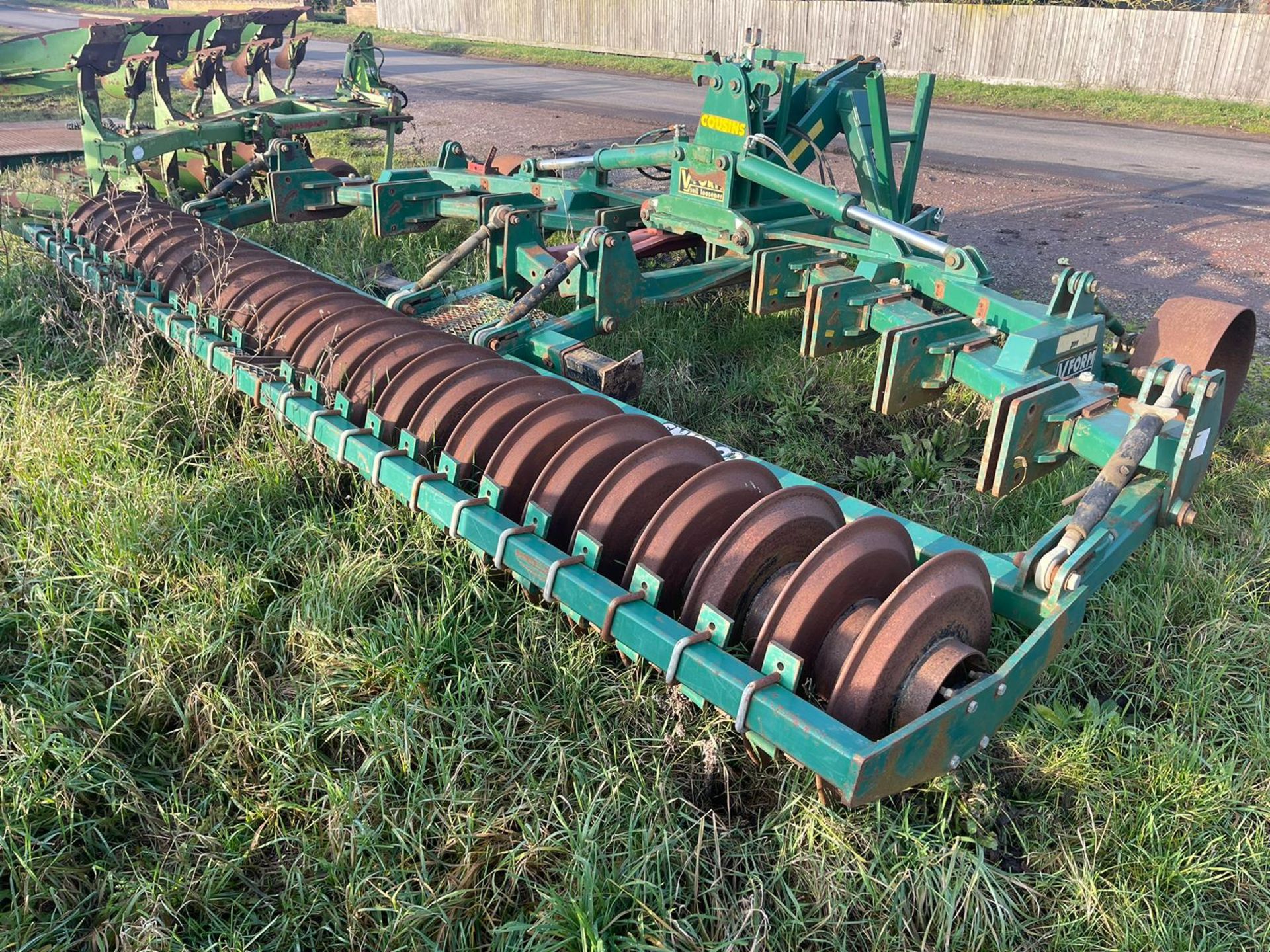 Cousins 9 leg V-form subsoiler, DD packer, legs on pallet