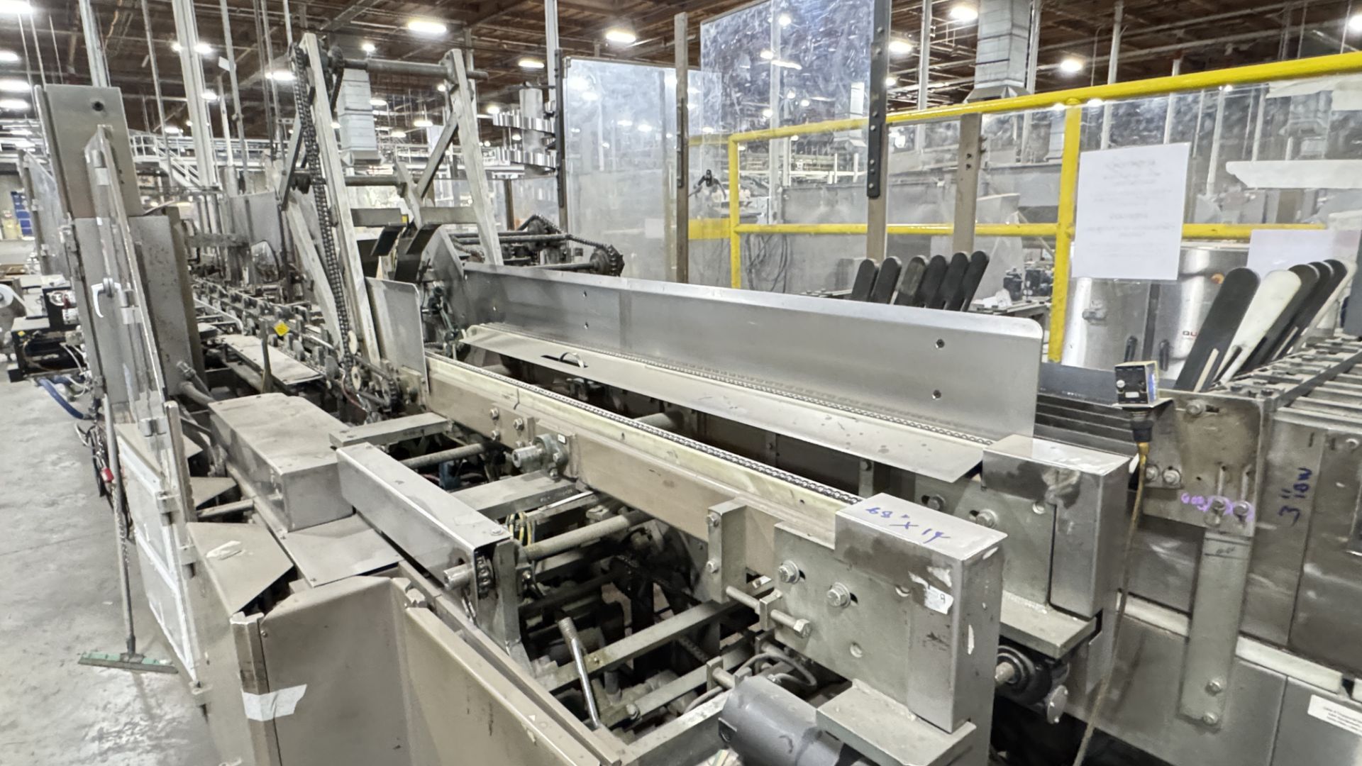 Douglas Continuous Motion Tray Former with Single Roll Wrapper/Heat ...