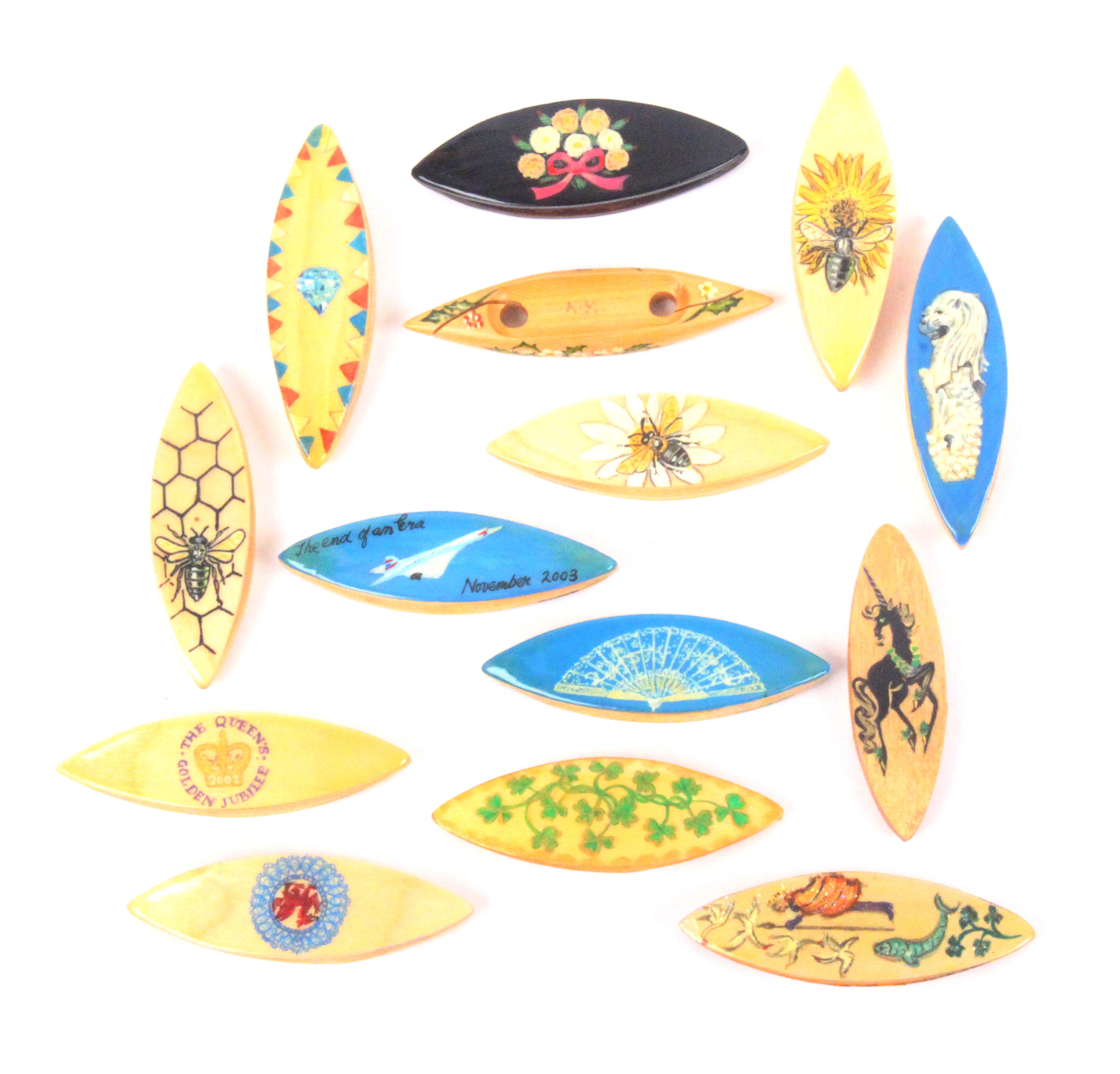 Modern wooden tatting shuttles, comprising ten painted examples signed ...