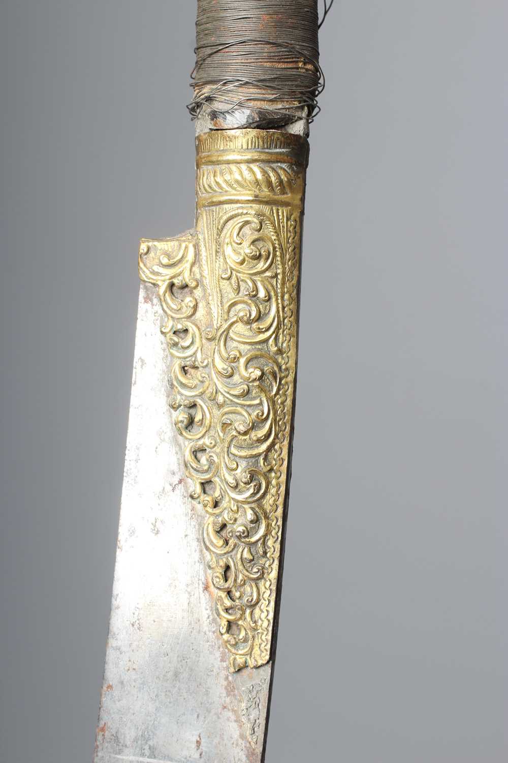 A TURKISH YATAGAN, 19th century, with 28 1/4" curved blade, one scroll ...