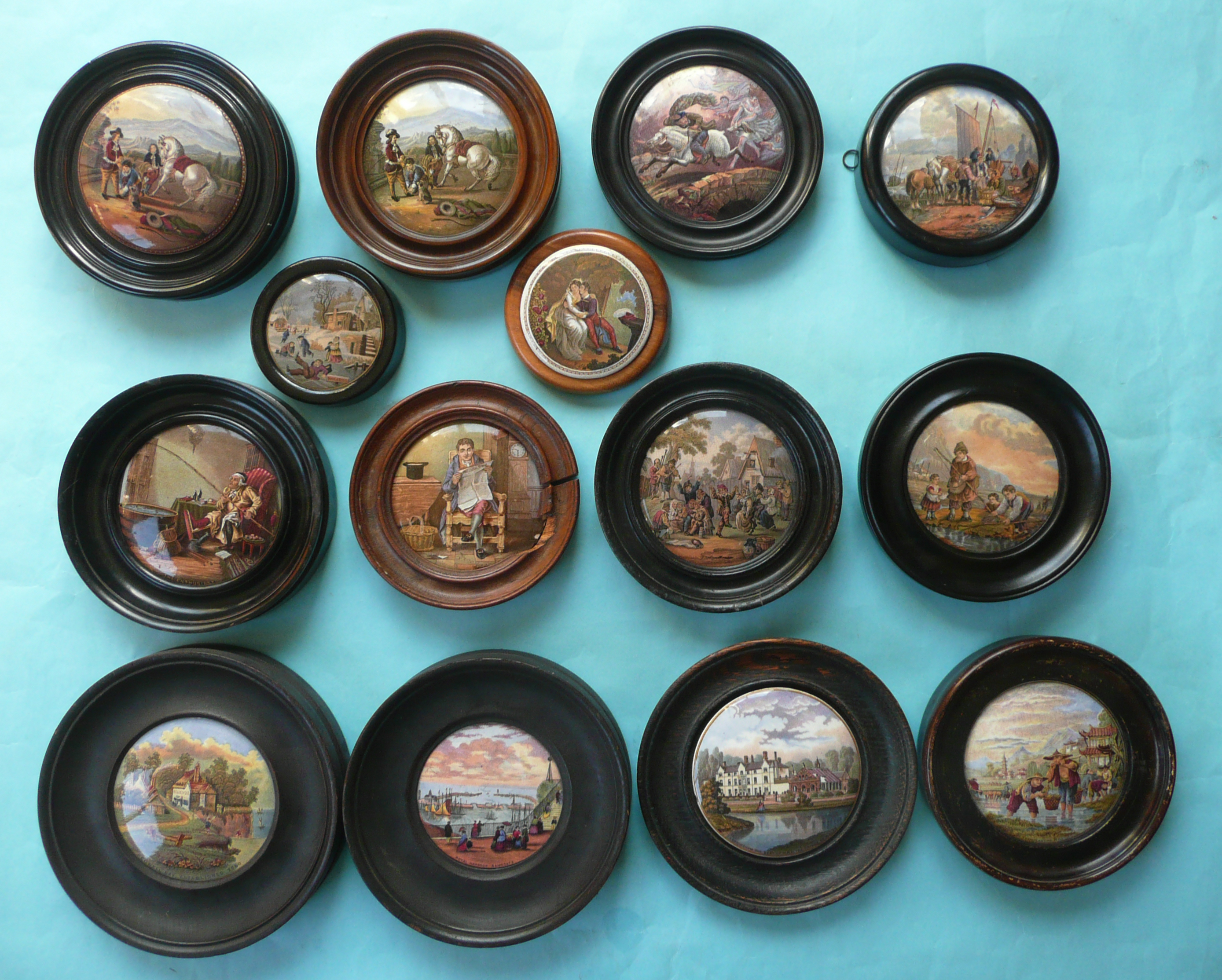 Fourteen various framed pot lids (14) (Prattware, Staffordshire ...